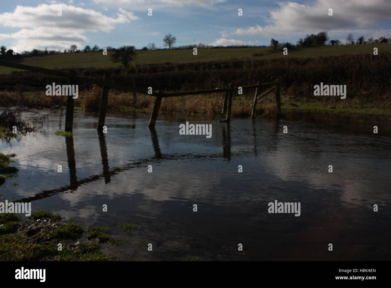 Countryside setting - fence over a country river scenic background in ...
