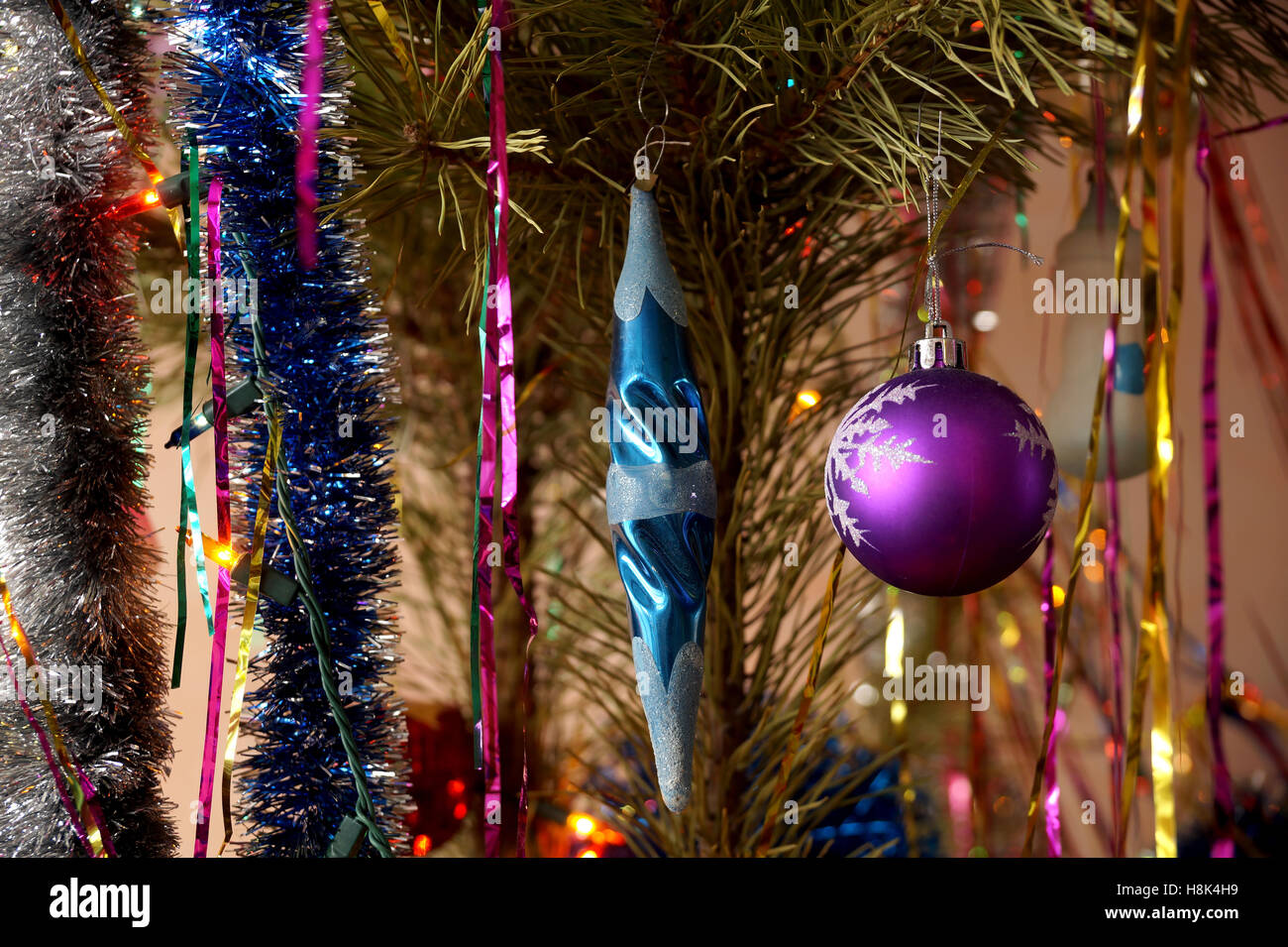 Fir-tree toy an icicle on a fir-tree Stock Photo - Alamy