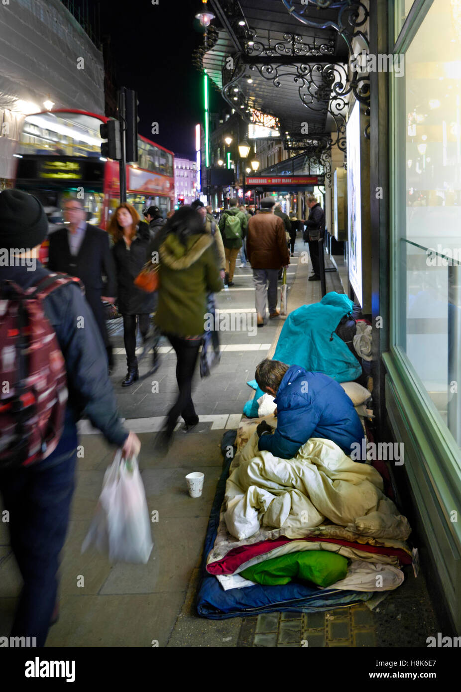 Homeless man sleeping on sidewalk hi-res stock photography and images ...
