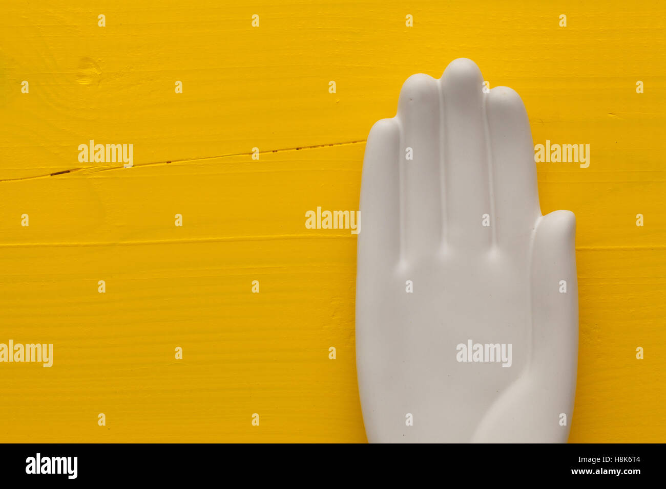 Detail of artifical hand on the wooden desk Stock Photo - Alamy