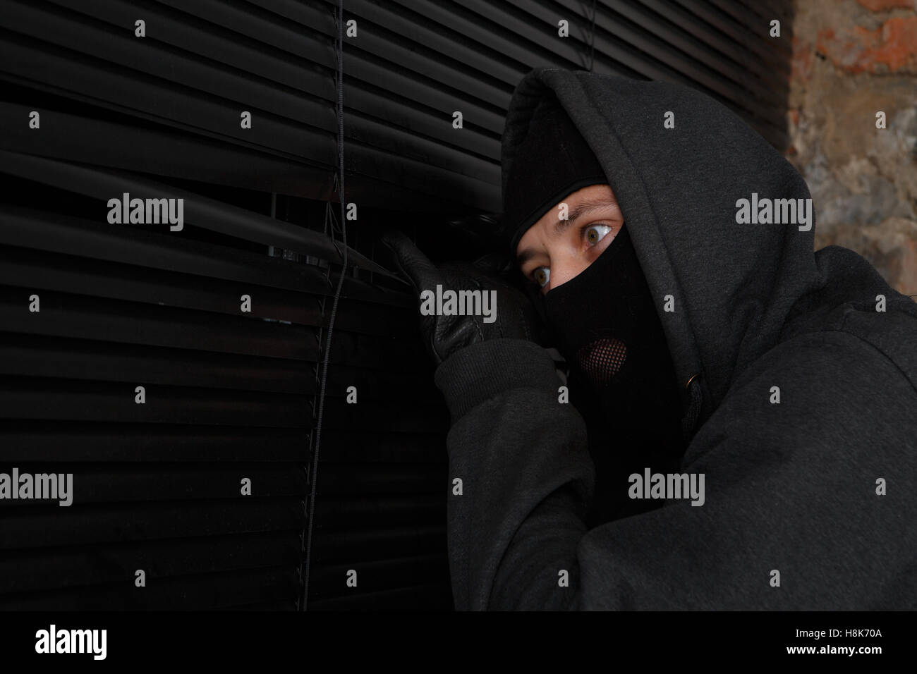 Man peeping window hi-res stock photography and images - Alamy