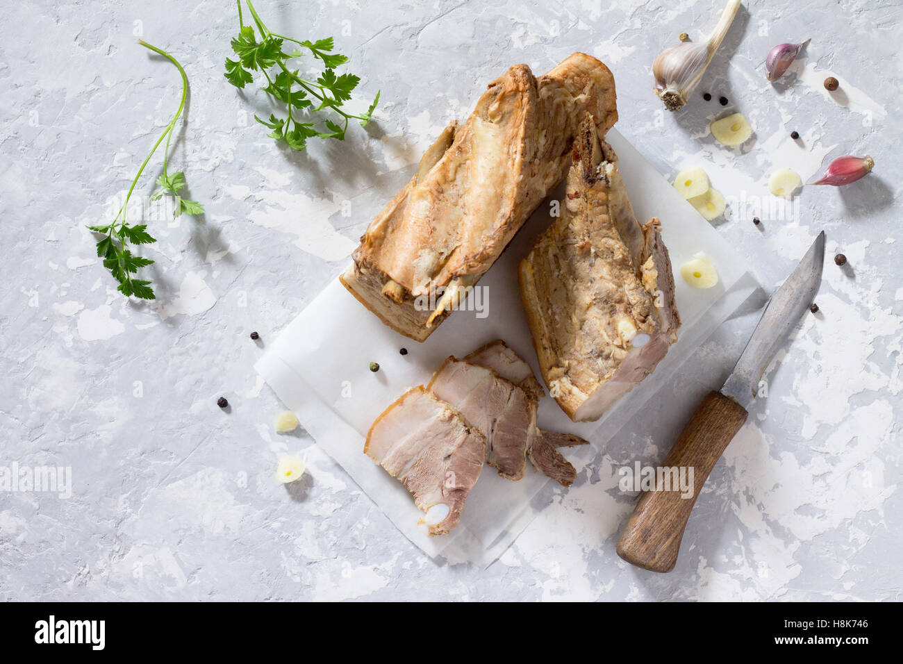 Raw meat layer. Raw raw pork lard on a gray stone background with ...