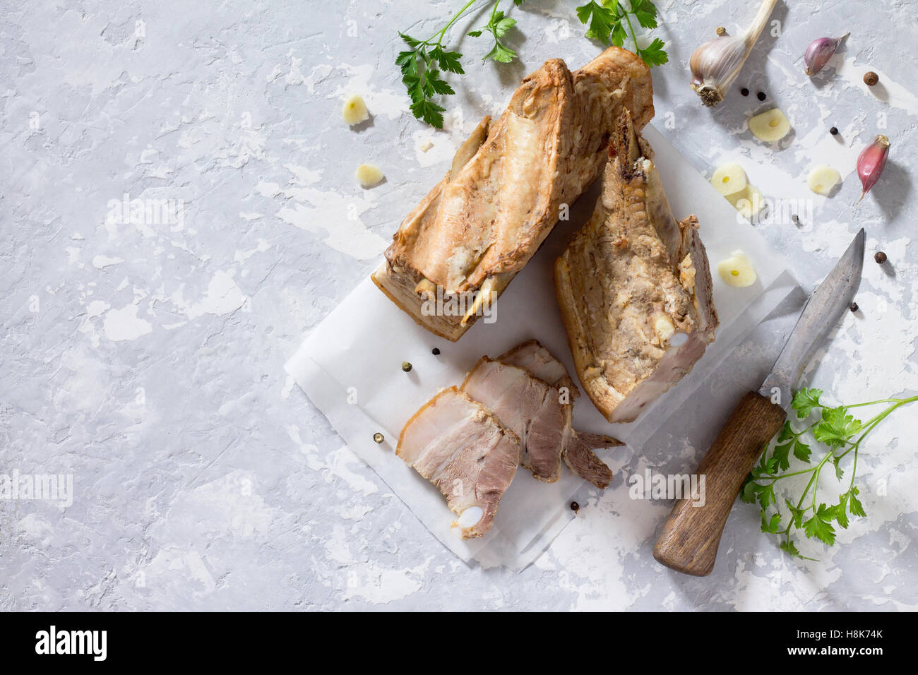 Raw meat layer. Raw raw pork lard on a gray stone background with ...