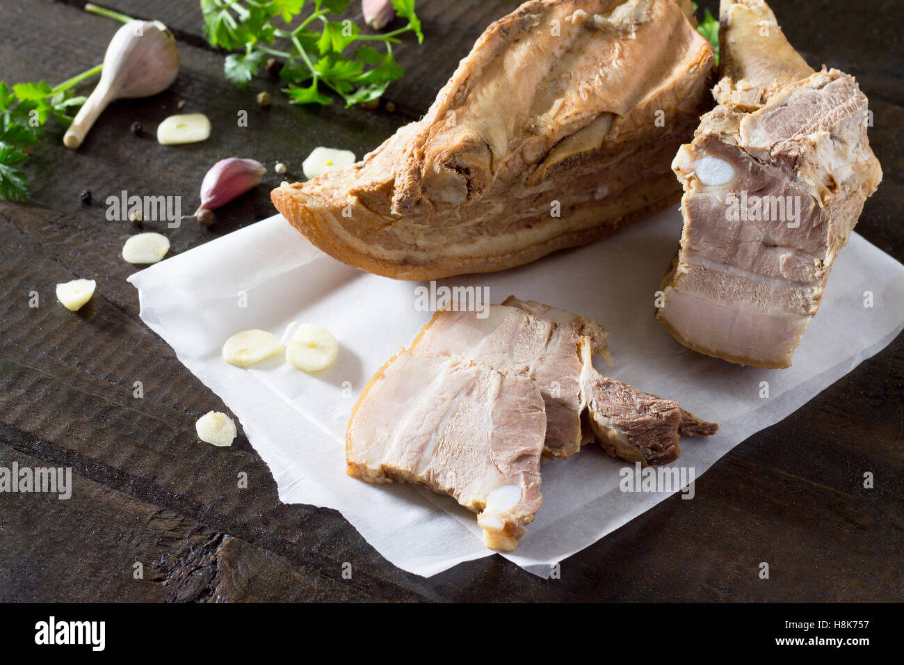 Raw meat layer. Raw Raw lard from pork on a cutting board with garlic ...