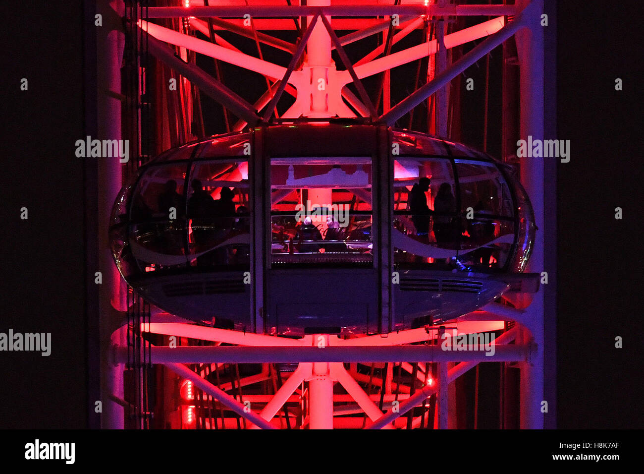 The London Eye is lit up red and green in for Remembrance Sunday Stock ...