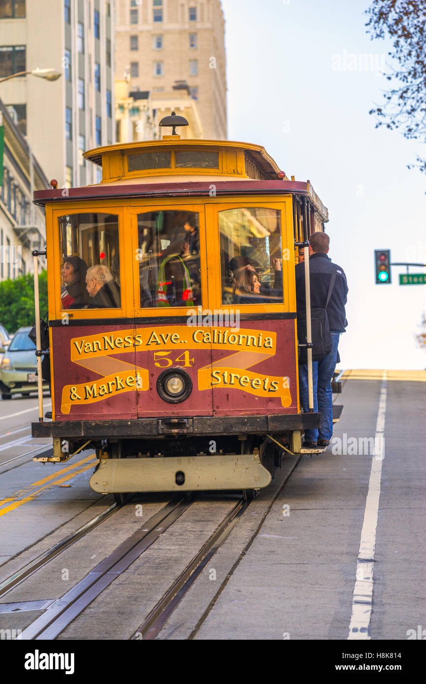 SAN FRANCISCO, USA - DECEMBER 16: Passengers enjoy a ride in a cable ...