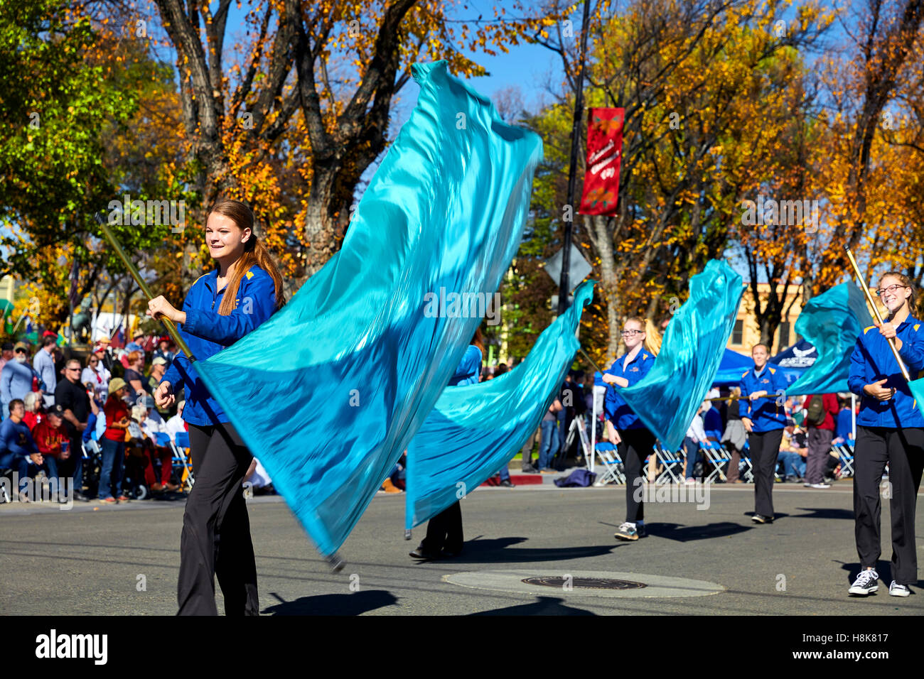 Prescott, AZ, USA - November 10, 2016: Young women waving flag batons ...