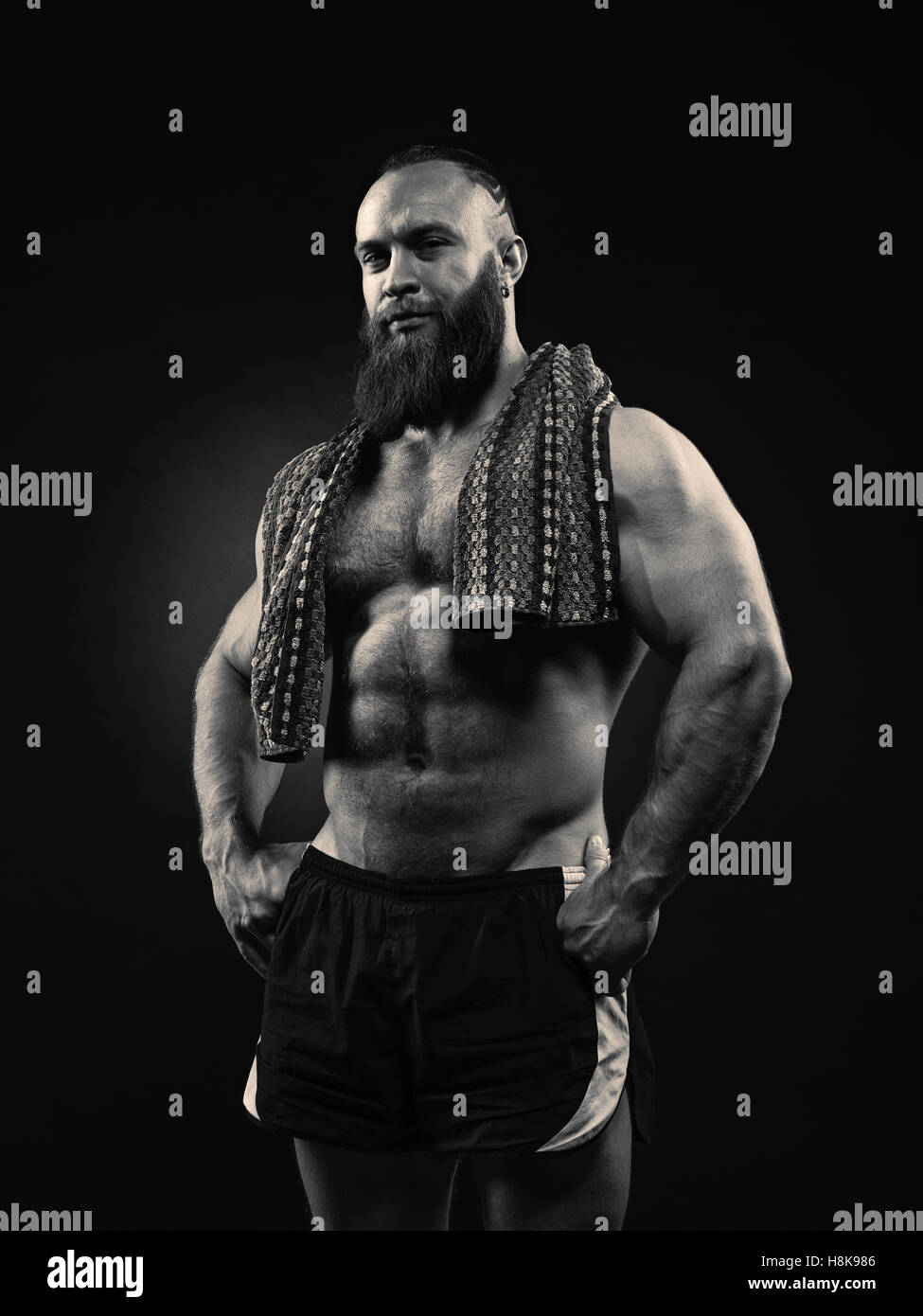 Portrait of bearded strong man with perfect abs, pecs shoulders,biceps ...