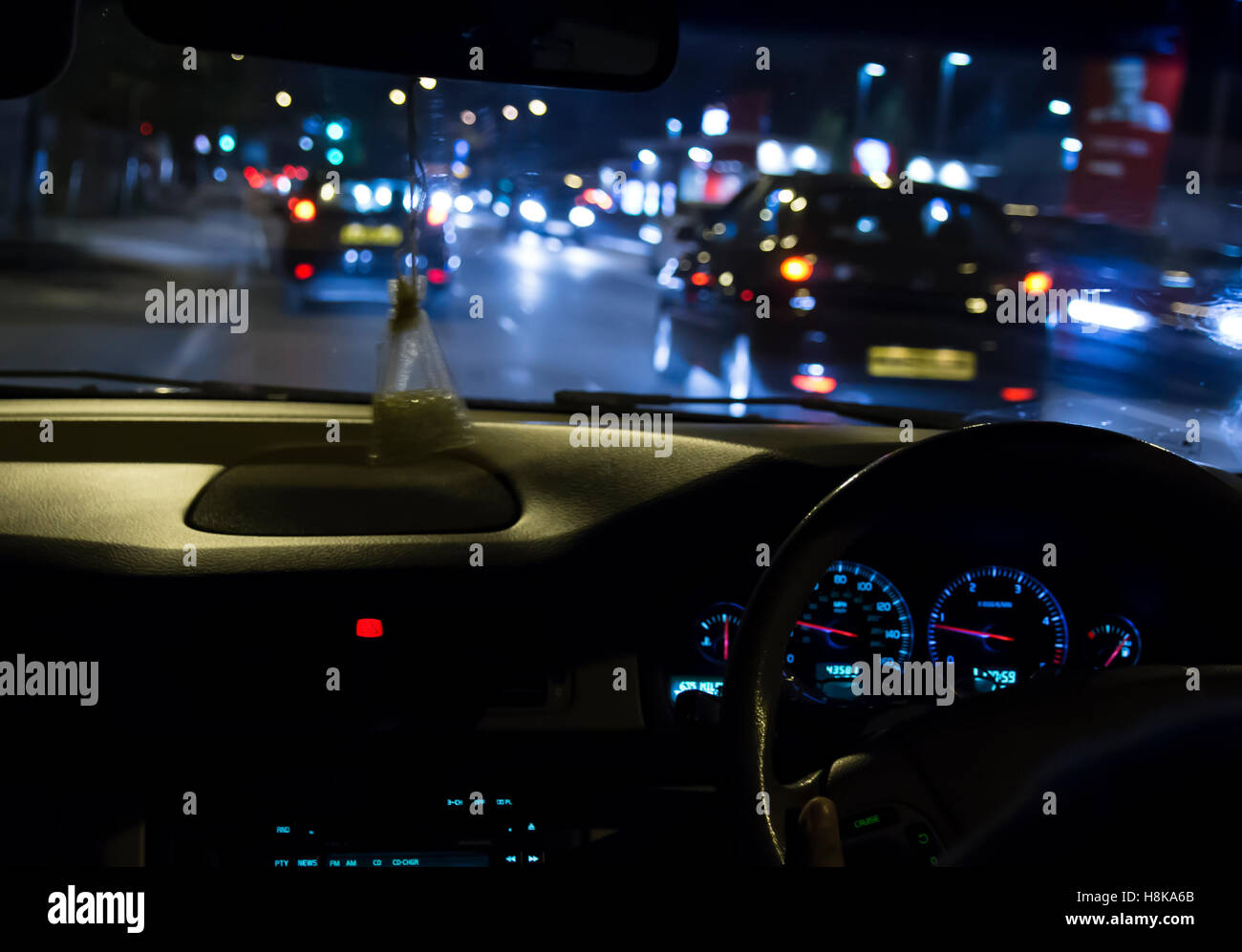Motion blurred view of night driving through the city Stock Photo - Alamy