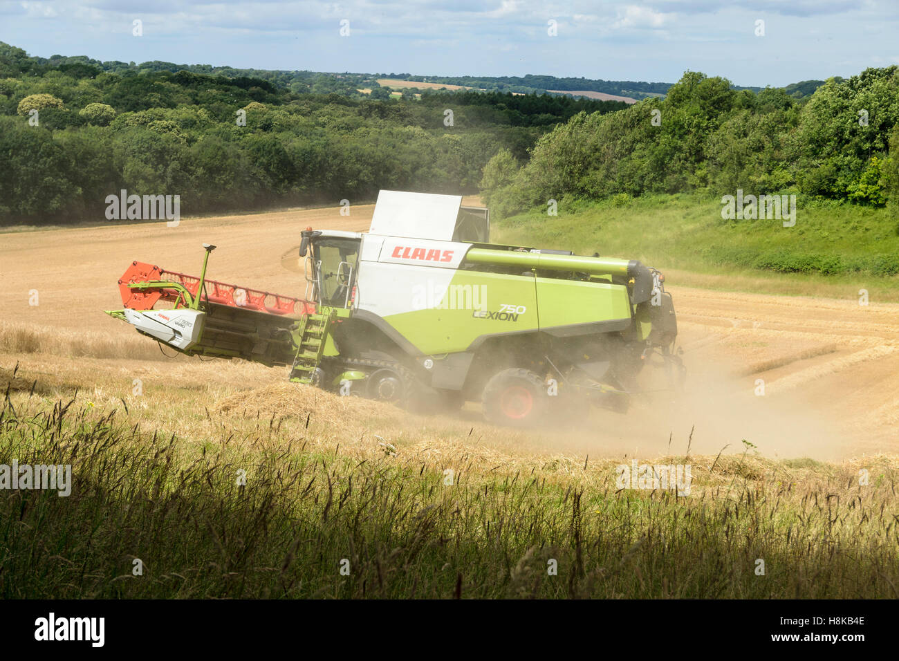 A Claas 750 Lexion Combine Harvester working the fields in Kent Stock ...