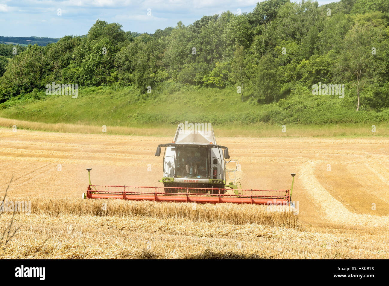 A Claas 750 Lexion Combine Harvester working the fields in Kent Stock ...