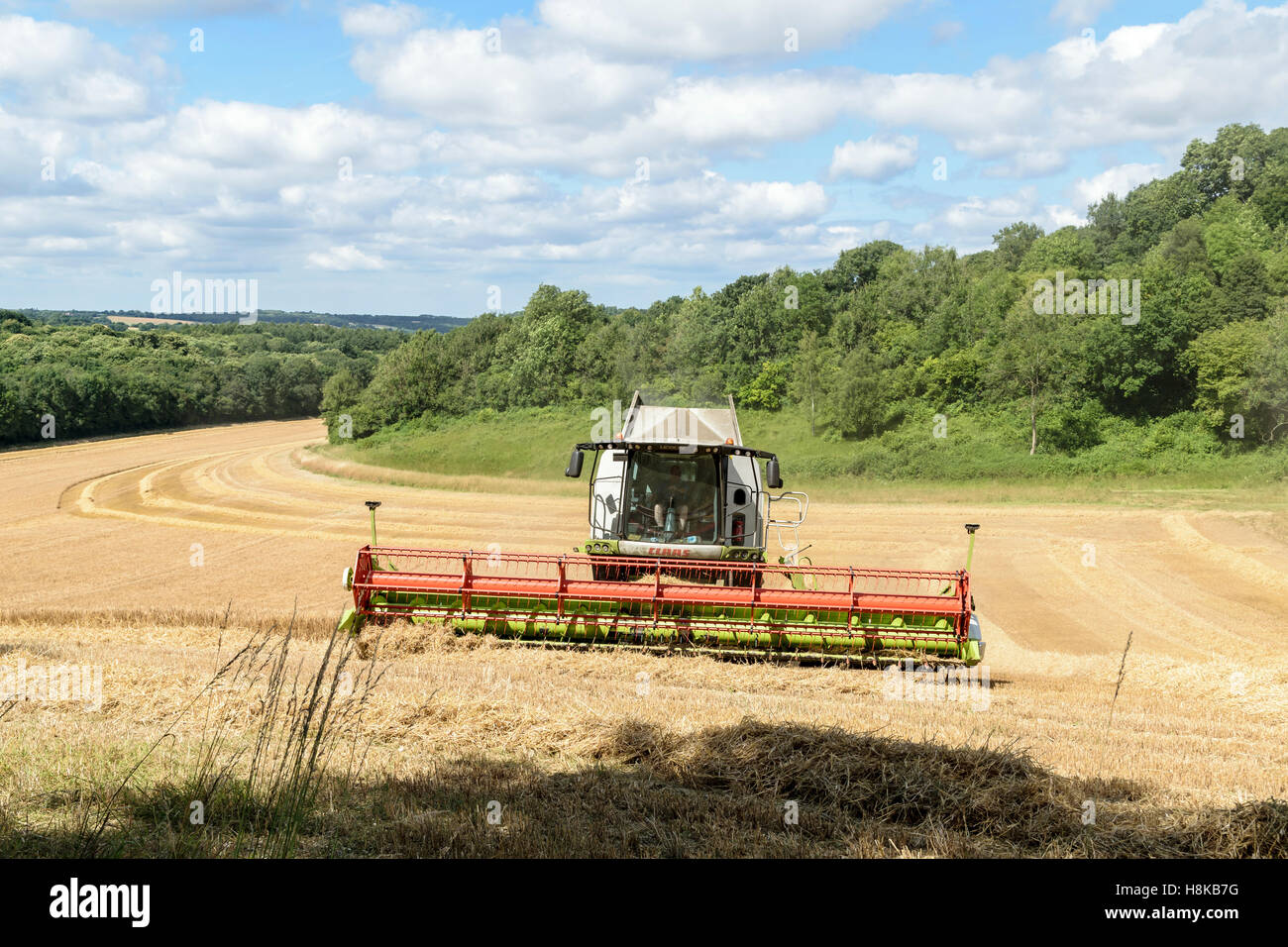 A Claas 750 Lexion Combine Harvester working the fields in Kent Stock ...
