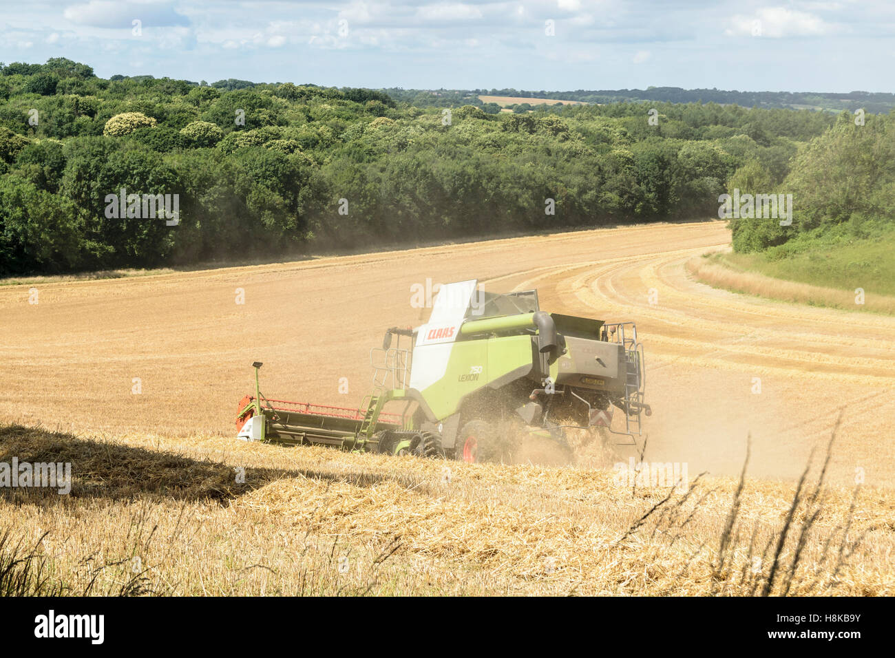 A Claas 750 Lexion Combine Harvester working the fields in Kent Stock ...
