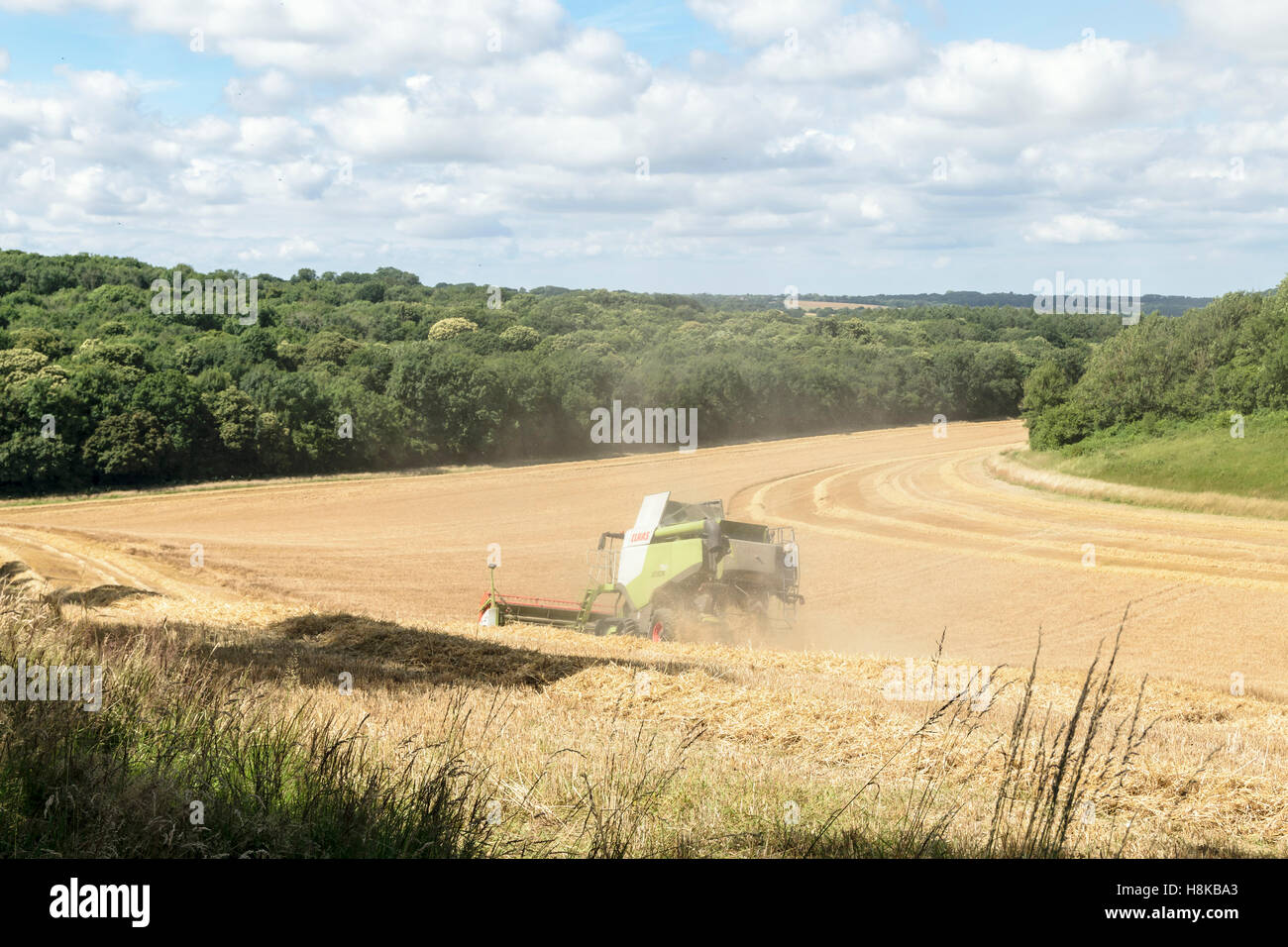 A Claas 750 Lexion Combine Harvester working the fields in Kent Stock ...