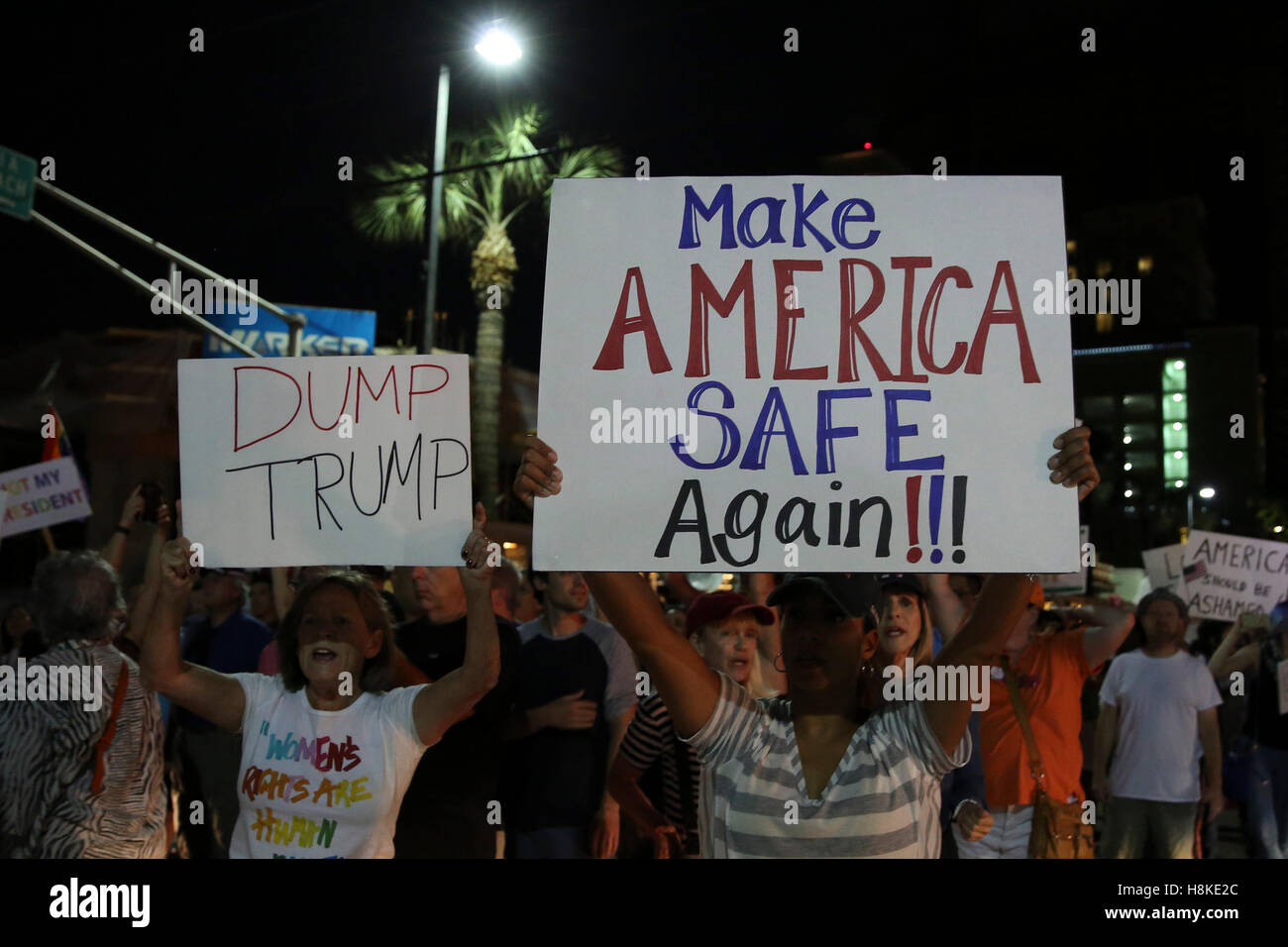 Protestors hold up placards at an anti Donald Trump rally on 13th ...