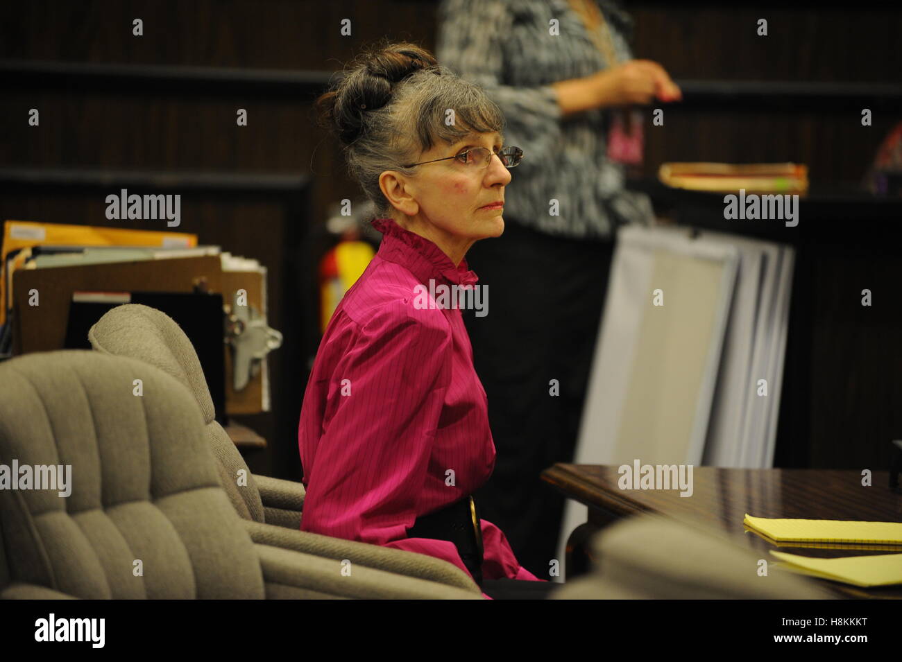 Colleen Harris waits while her attorney and prosecution meet with Judge ...
