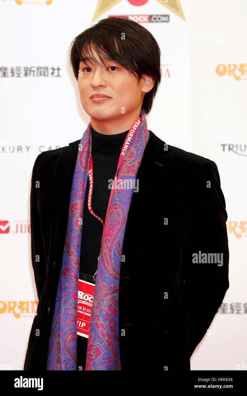 Actor Yuya Ozeki poses for the cameras during the red carpet for the ...