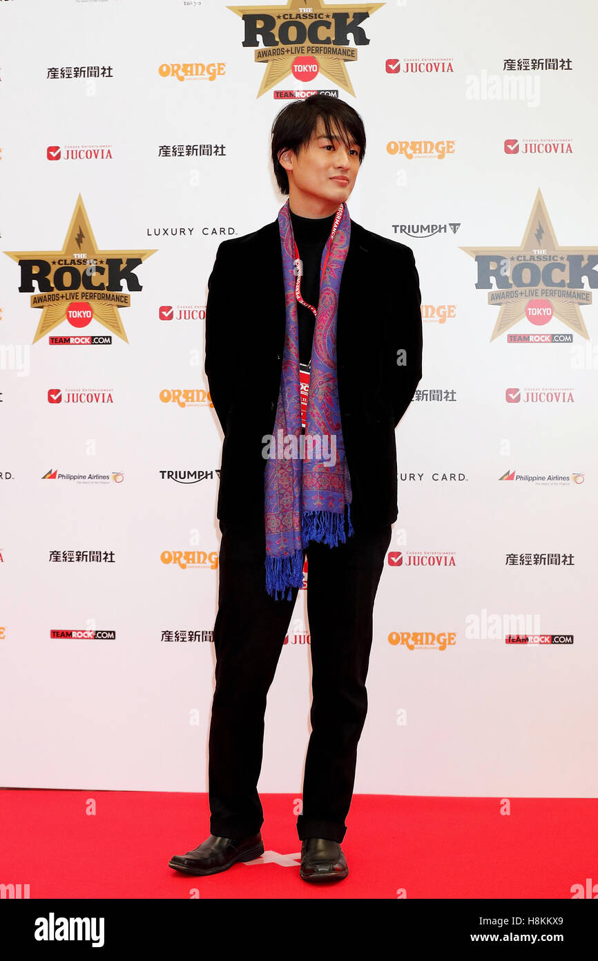 Actor Yuya Ozeki poses for the cameras during the red carpet for the ...