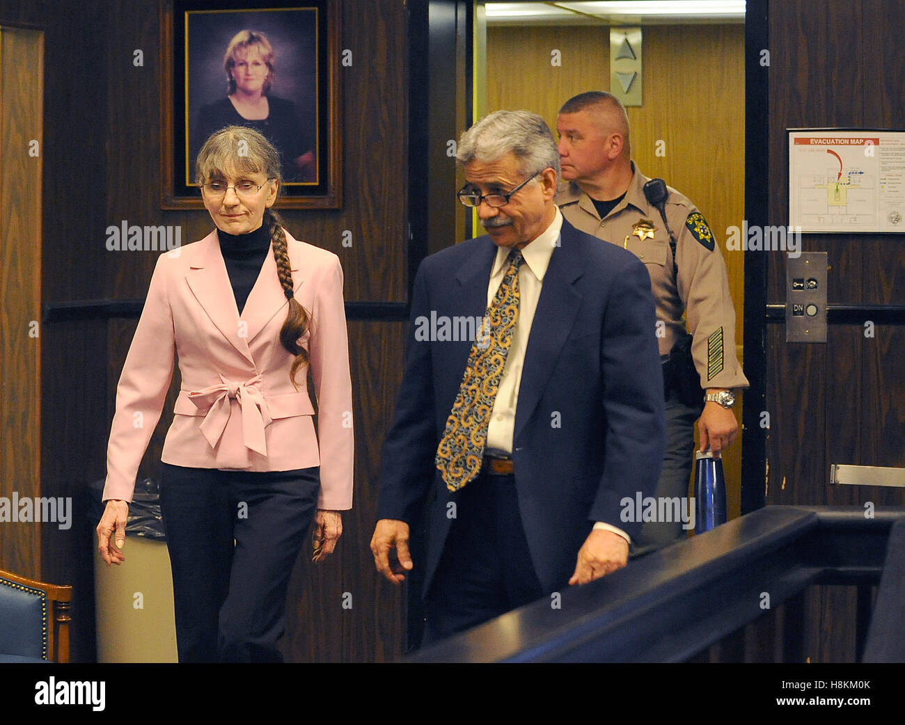 COLLEEN HARRIS walks to the courtroom with her attorney, David Weiner ...