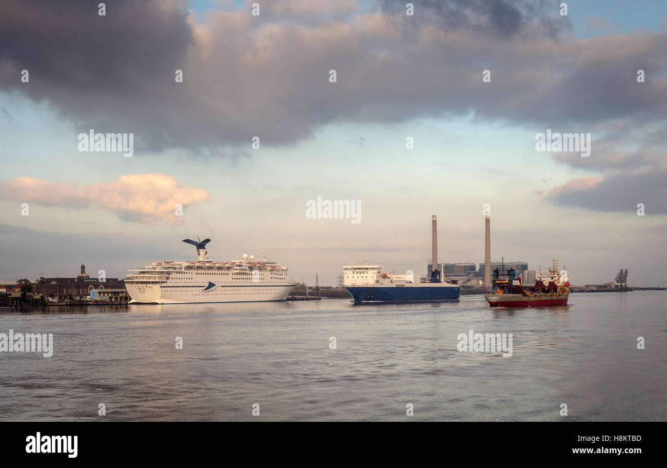 two ships on river thames passing the moored cruise ship cmv magellan ...