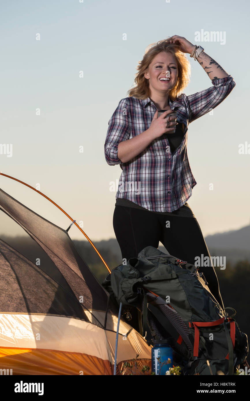 Beautiful woman backpacking in wilderness Stock Photo - Alamy