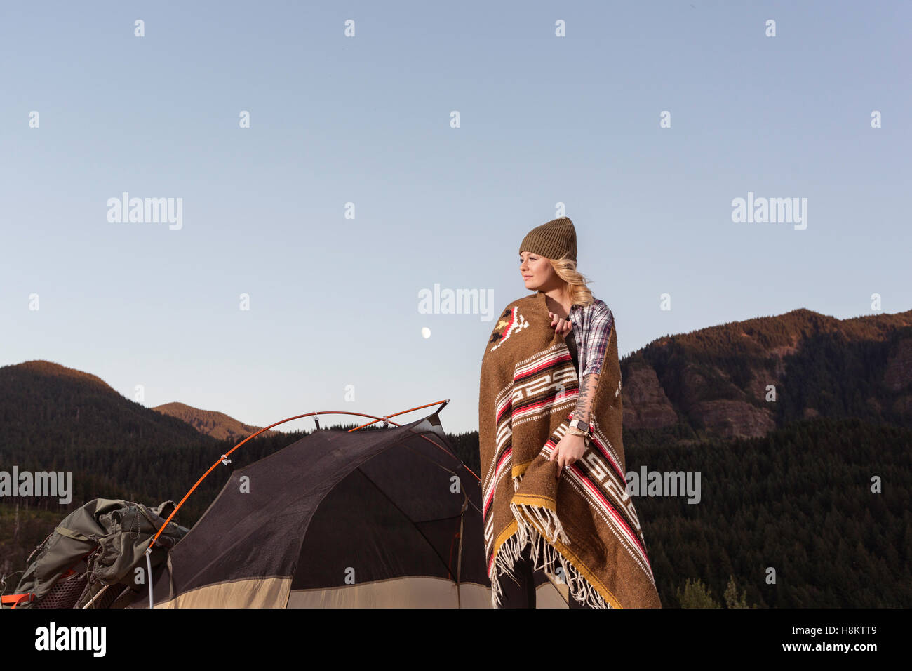 Beautiful woman backpacking in wilderness Stock Photo - Alamy