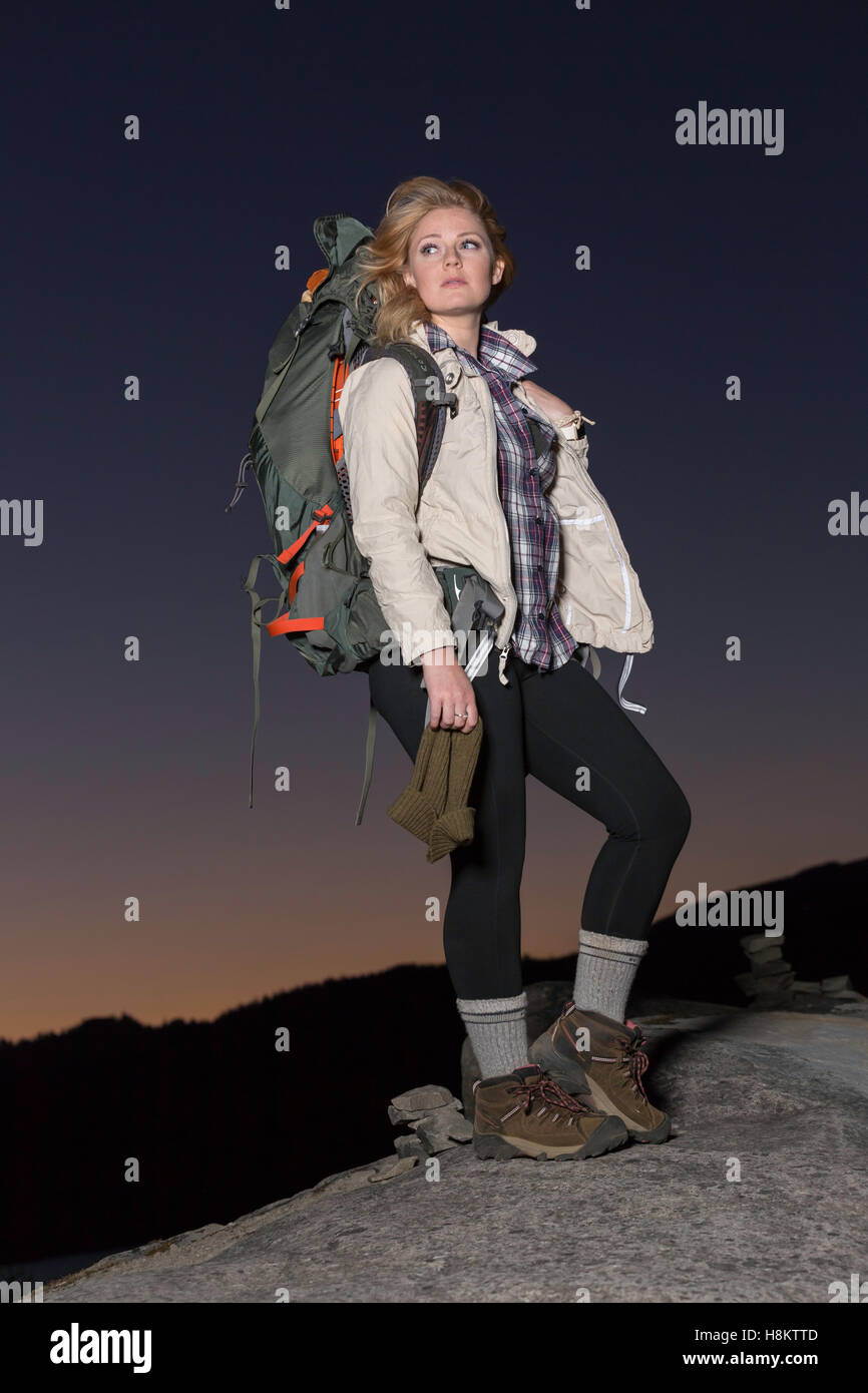 Beautiful woman backpacking in wilderness Stock Photo - Alamy