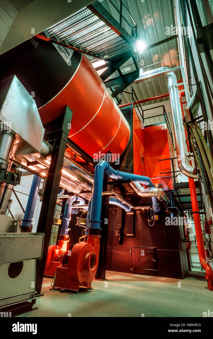 Incinerator for generatiNg energy from woodchips in a kitchen factory ...