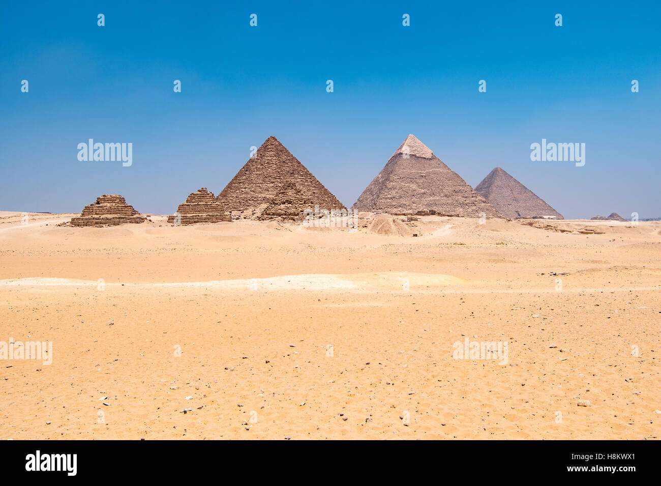 Cairo, Egypt Vast Sahara desert with the three Great pyramids of Giza ...