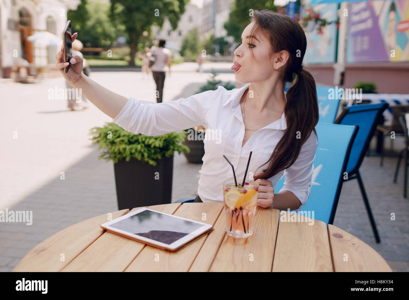 business woman enjoys gadgets Stock Photo - Alamy
