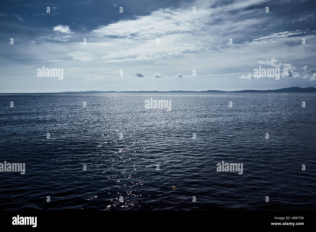 Photo of Blue Sea and Tropical Sky Clouds Stock Photo - Alamy