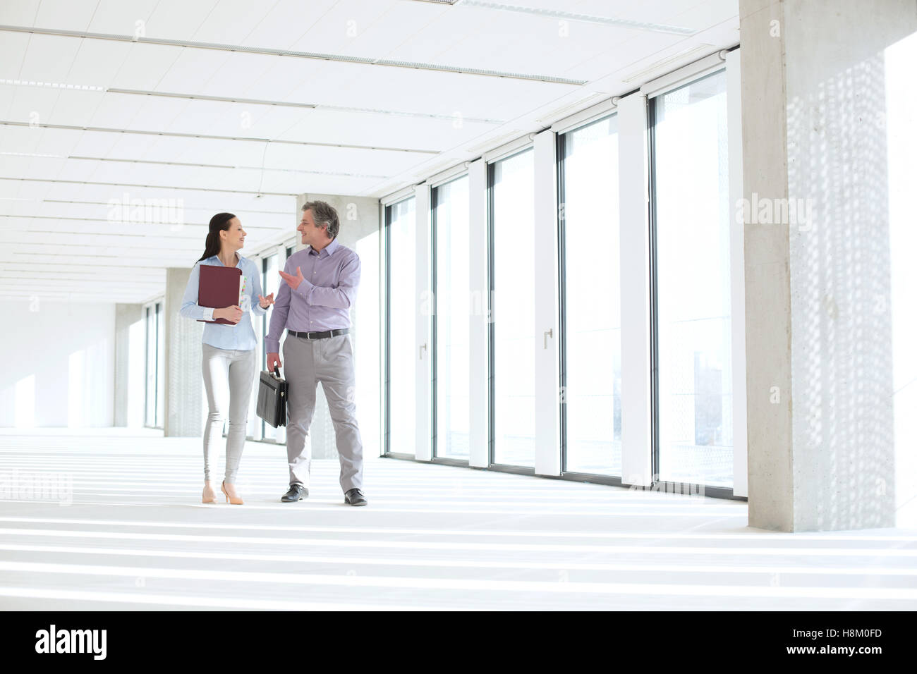 Office worker walking hi-res stock photography and images - Alamy