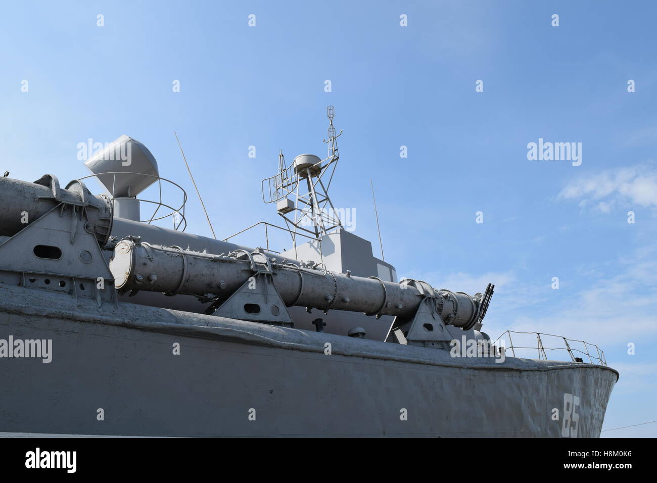 Part of the deck of a warship. communication devices and deck guns ...