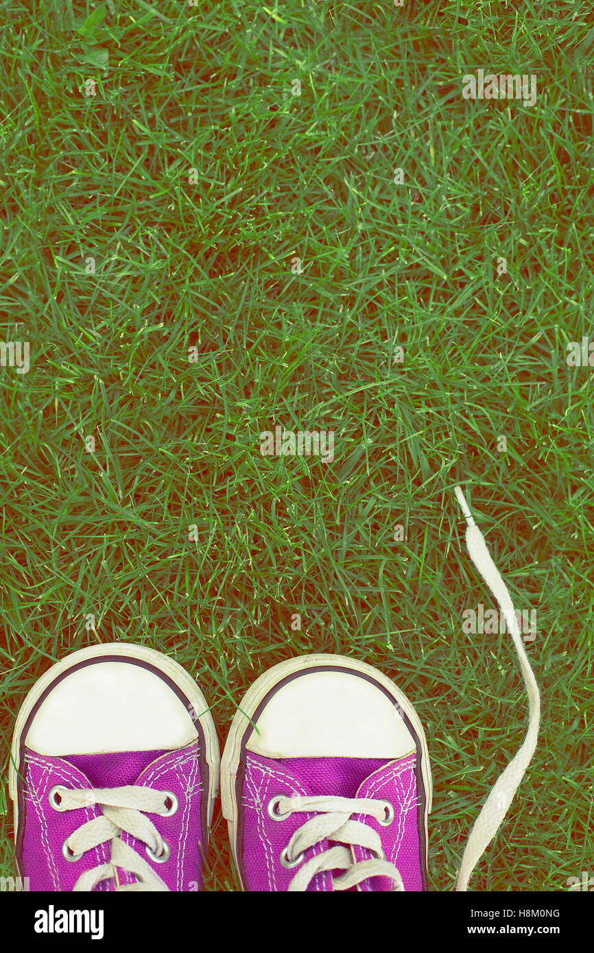 outdoor portrait of a little girl sneakers shoes Stock Photo - Alamy
