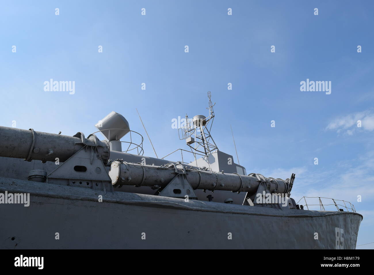 Part of the deck of a warship. communication devices and deck guns ...