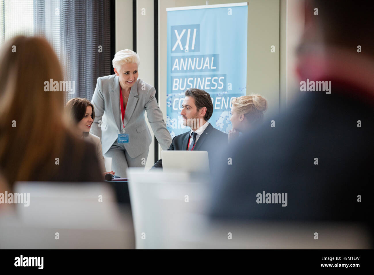 Talking during conference hi-res stock photography and images - Alamy