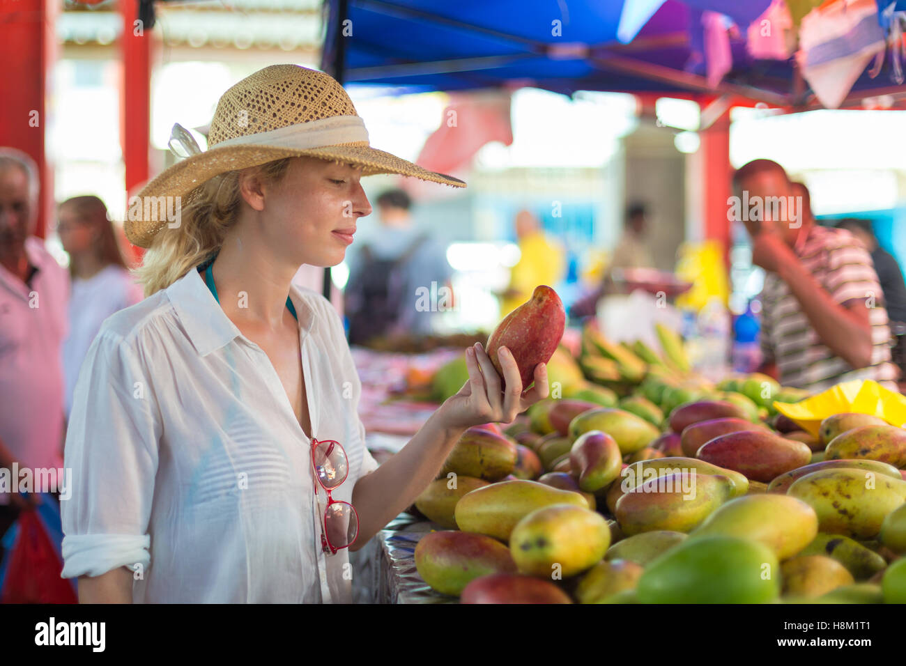 Traveler shopping on traditional Victoria food market, Seychelles Stock ...