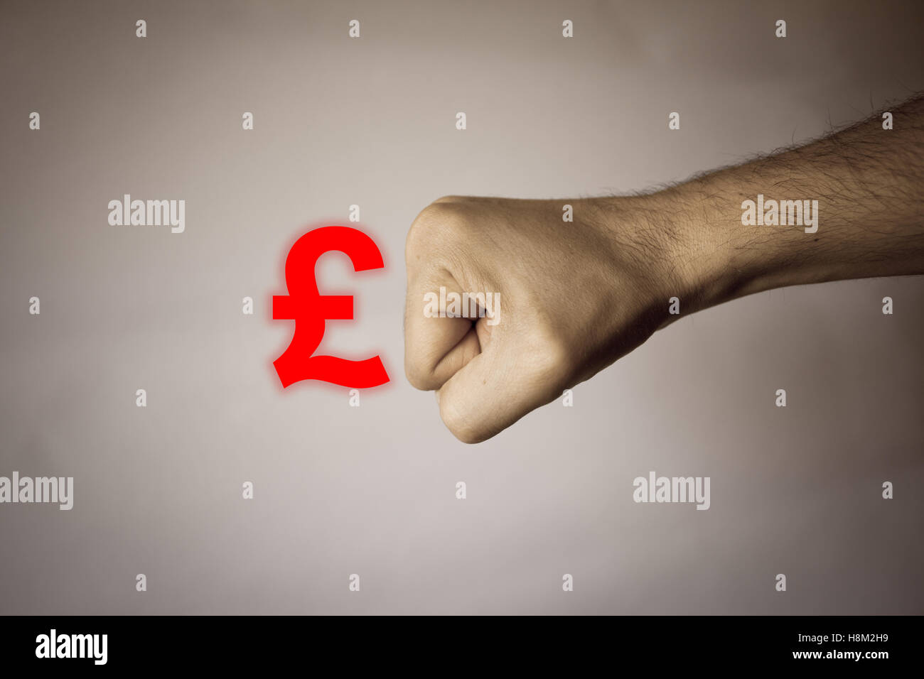 Human hand on vintage background to express strength against pound ...