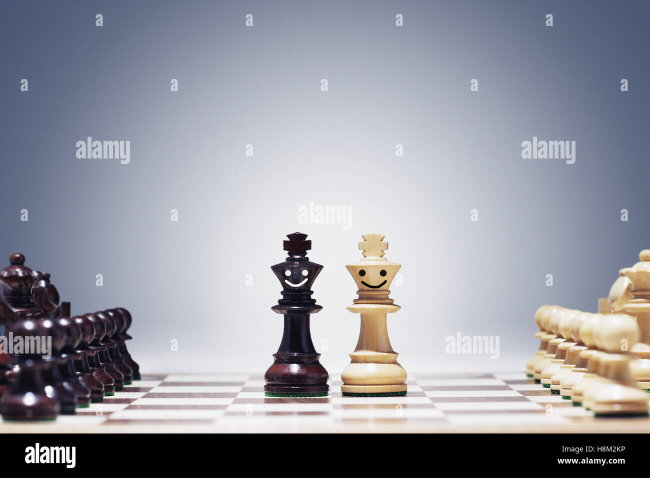 Chess pieces as little action figures Stock Photo - Alamy