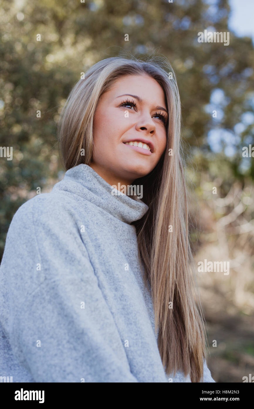 Young woman in the nature in a relaxed day Stock Photo - Alamy