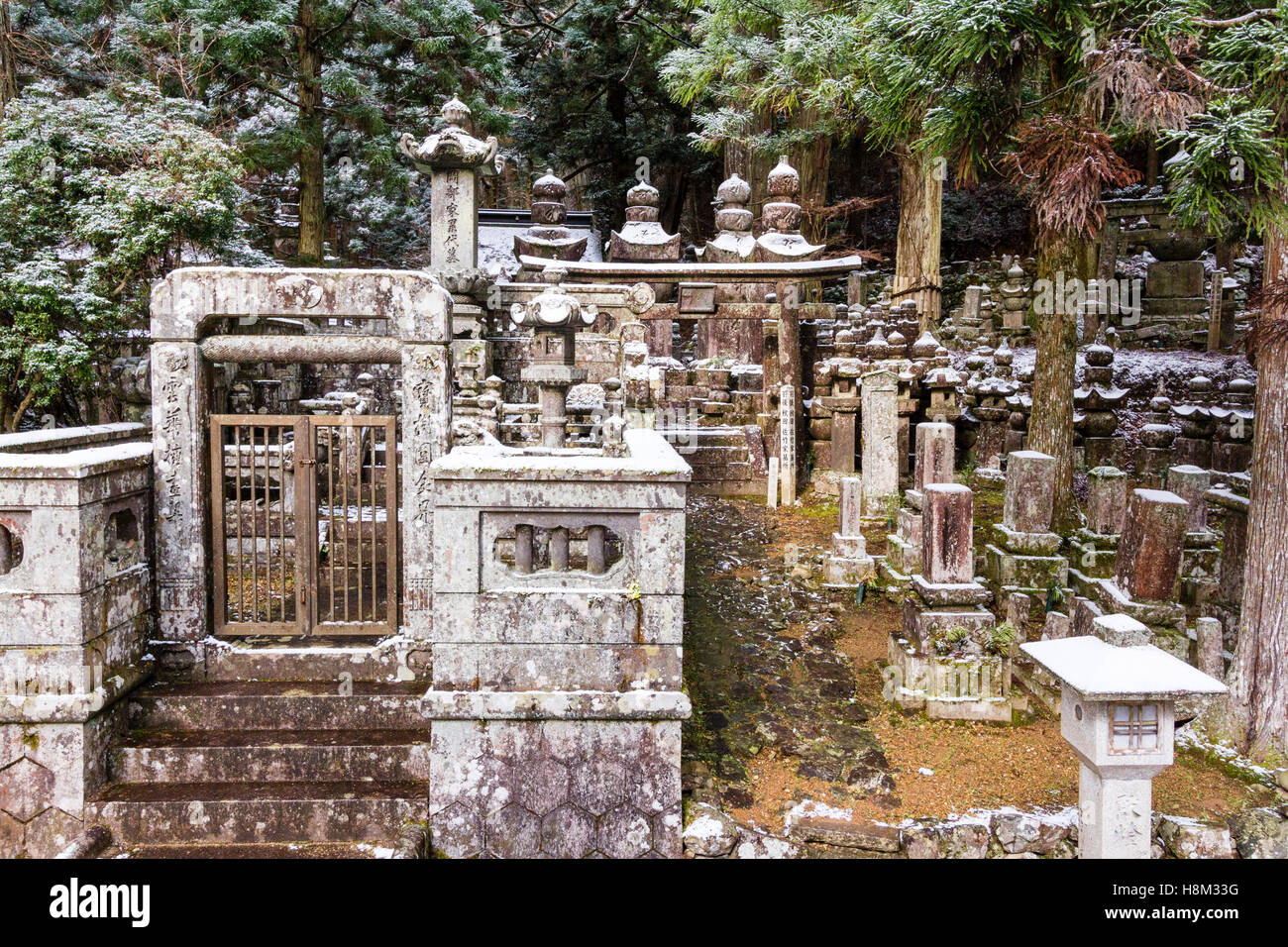 Koyasan, famous ancient Okunoin cemetery in Japan. Stone tombstones ...