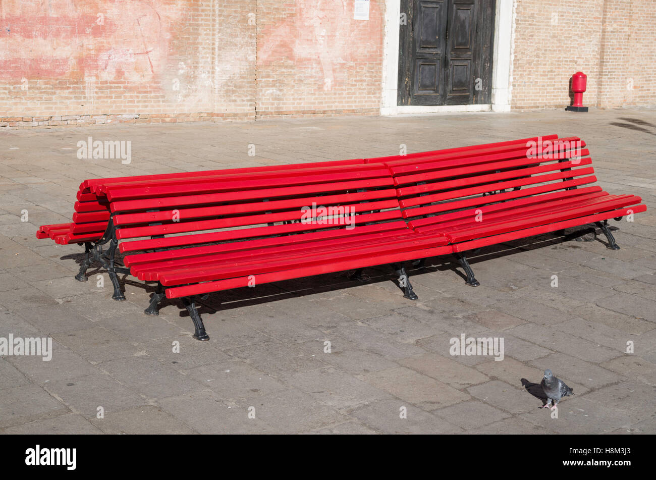 Red bench Venice Italy Stock Photo - Alamy