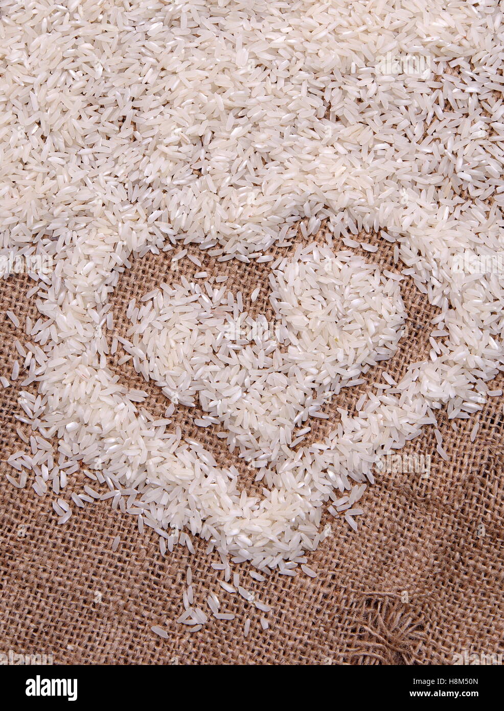 rice heart shaped on table Stock Photo - Alamy