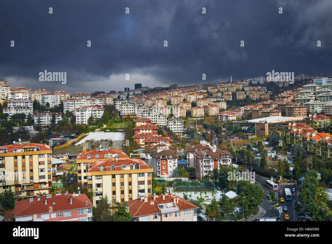 A storm clearing above a neighborhood in Istanbul, Turkey Stock Photo ...