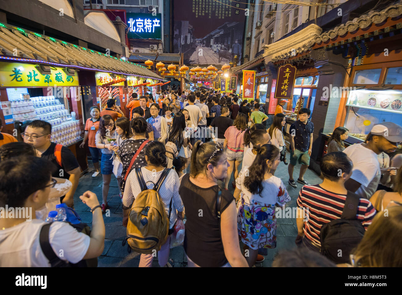 Beijing, China - Crowds of people walking through the Donghuamen Snack ...