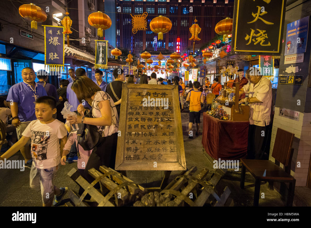 Beijing, China - Crowds of people walking through the Donghuamen Snack ...