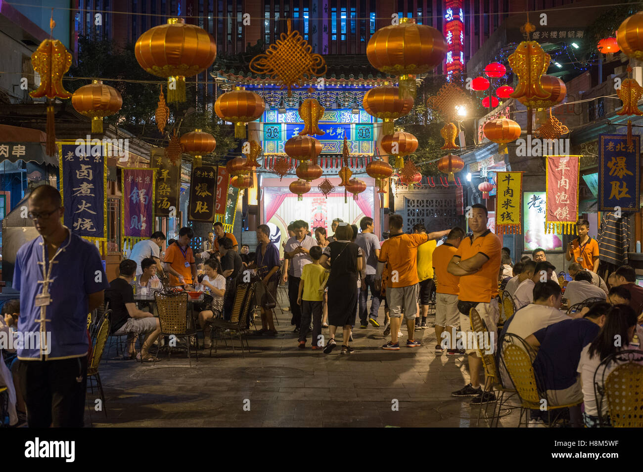 Beijing, China - Crowds of people walking through the Donghuamen Snack ...