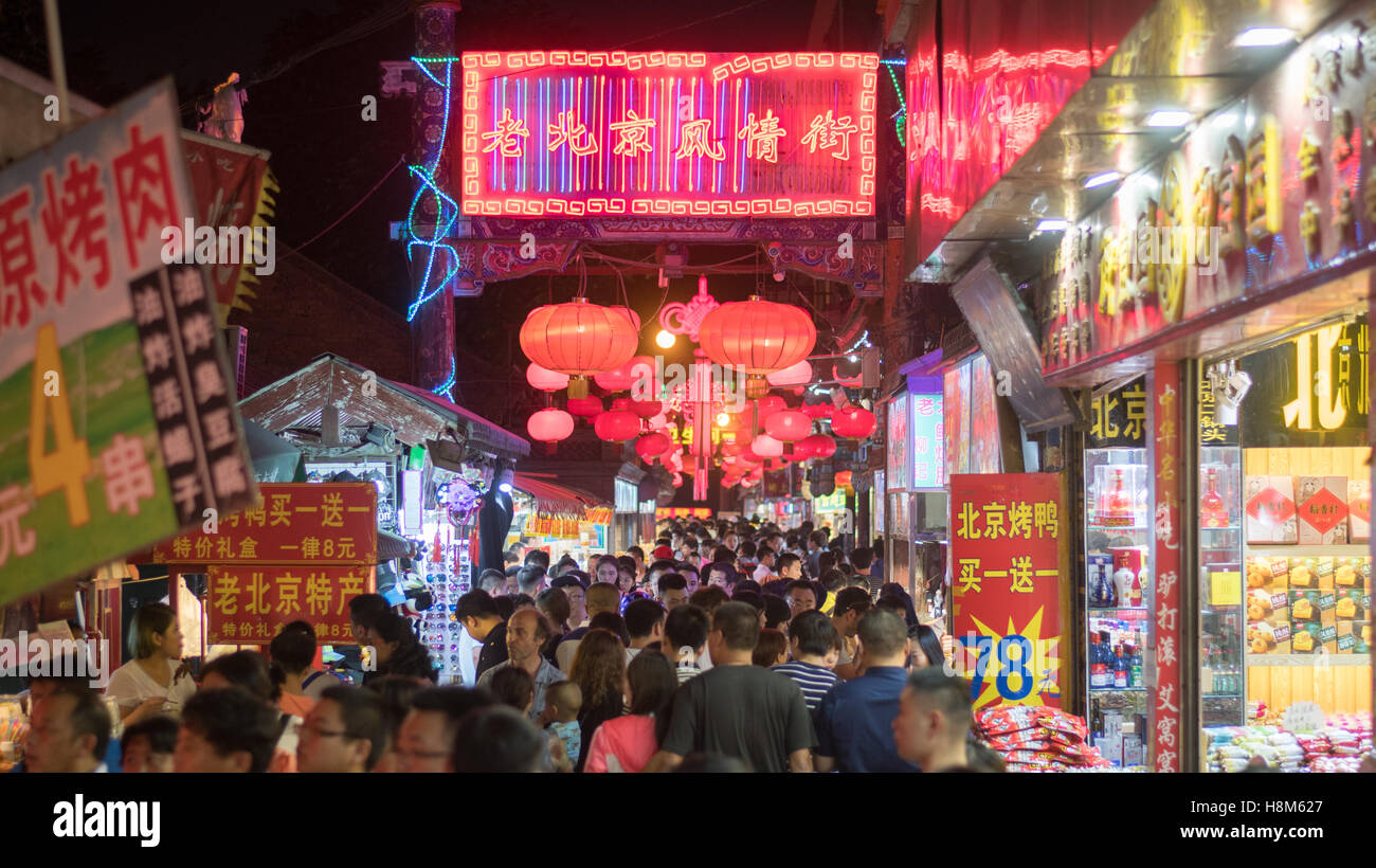 Beijing, China - Crowds of people walking through the Donghuamen Snack ...