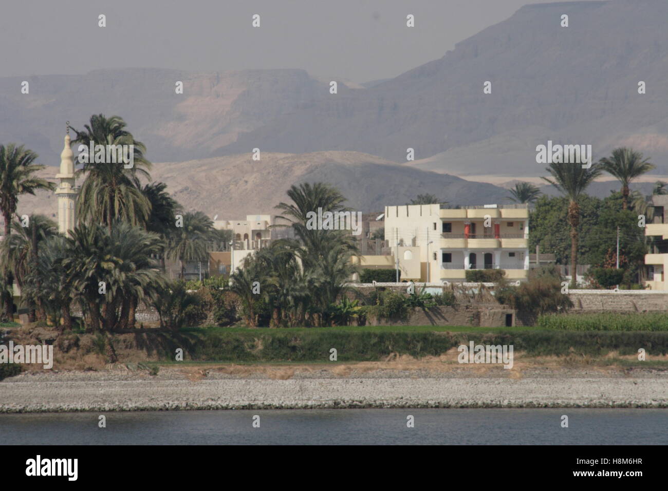 Houses on the river Nile bank Stock Photo - Alamy