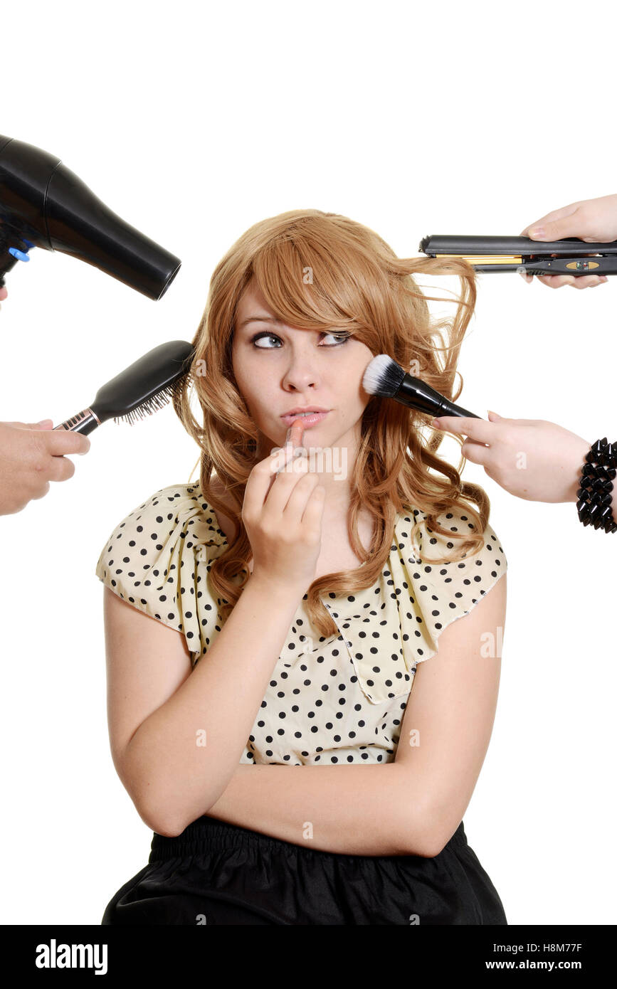 Multi tasking teen girl makeover Stock Photo - Alamy